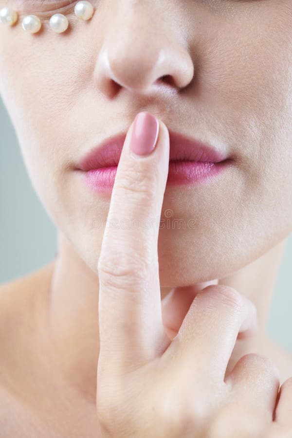 Touching Lips with Finger stock photo. Image of adult - 226299892