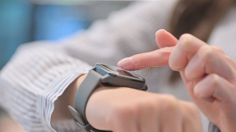 Close Up of Young Woman Using Smartwatch Stock Photo - Image of ...