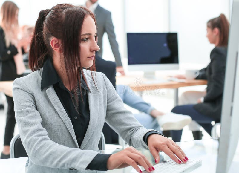 Young Woman Working on a Computer in a Modern Office Stock Image ...