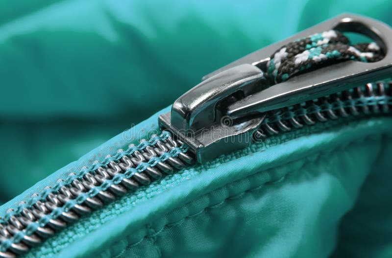 Close-up of the Zipper on the Turquoise Clothing. Zipper with Lock ...