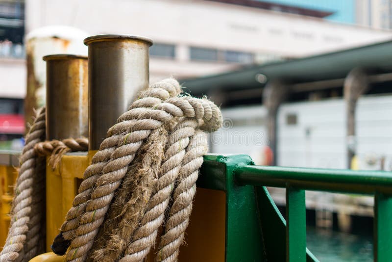 Close View of Anchoring Ropes on a Ferry Pulling into a Harbour City ...