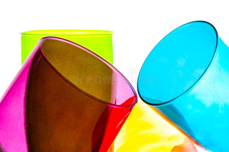 Close View of Colorful Glass Cups in Orange, Yellow, and Blue Arranged ...