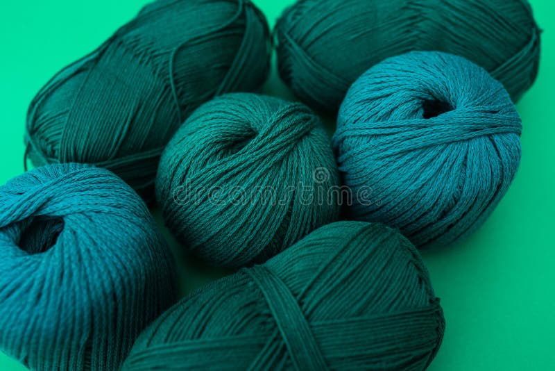 Close View of Dark Green Balls of Yarn with Different Types of T Stock ...