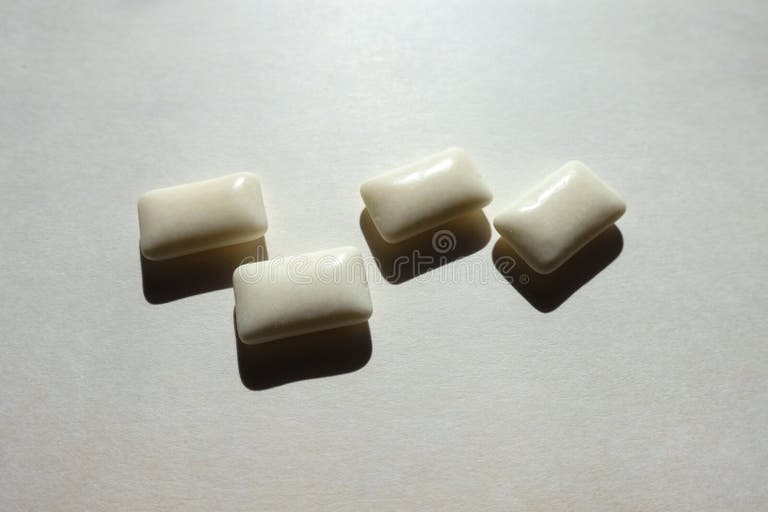Close View of Four White Pieces of Chewing Gum Stock Image - Image of ...