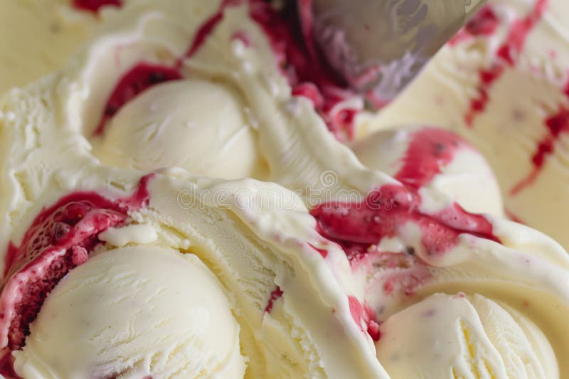 Close View of Fruit Ripple Being Added To Vanilla Ice Cream Stock Image ...