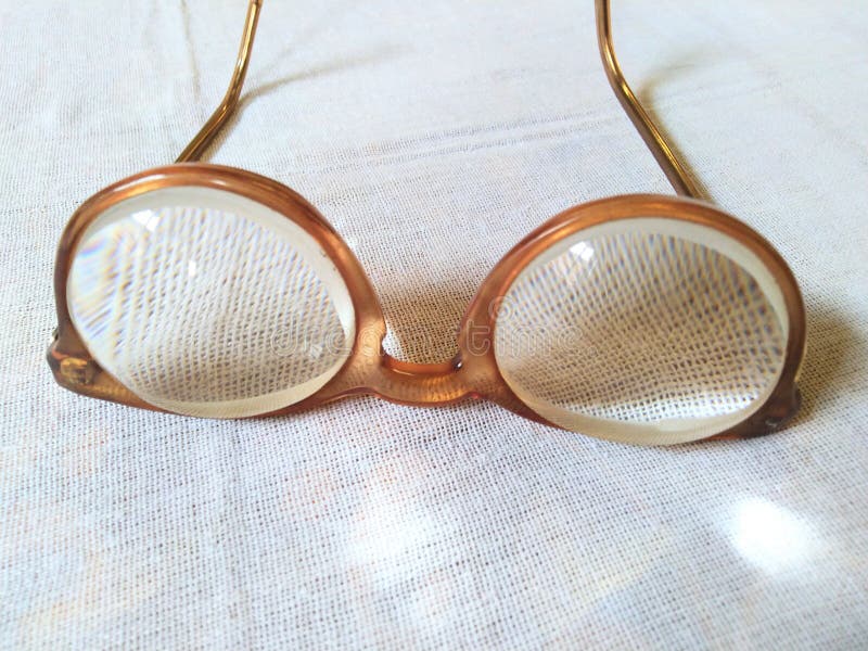 A Close View of High Power Eye Glasses on a White Background Stock ...