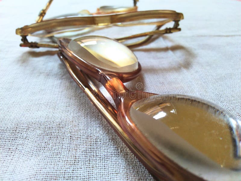A Close View of High Power Eye Glasses on a White Background Stock ...