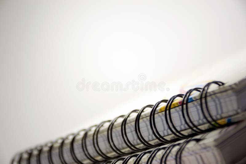 A Close View of an Open Diary or Notepad with Rings Isolated on a White ...