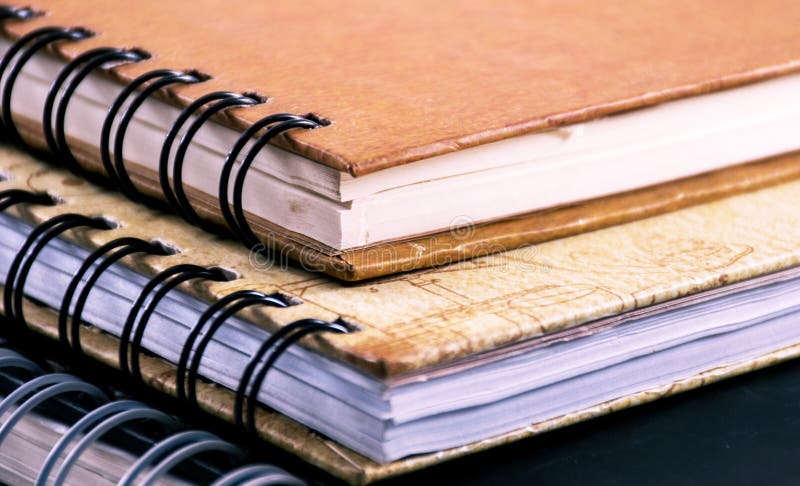 A Close View of an Open Diary or Notepad with Rings Isolated on a White ...