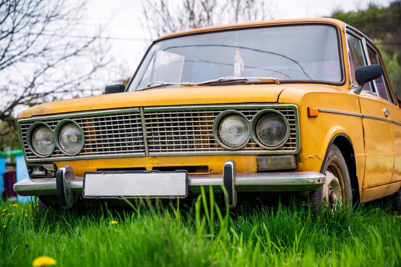 Yellow old soviet car stock image. Image of transportation - 278174555