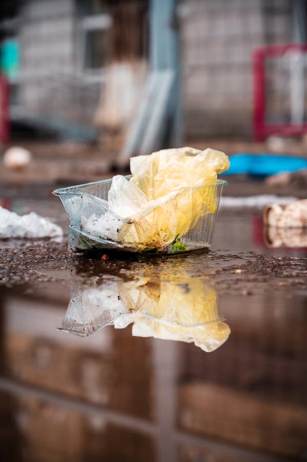 Close View of a Plastic Garbage on the Ground Stock Image - Image of ...