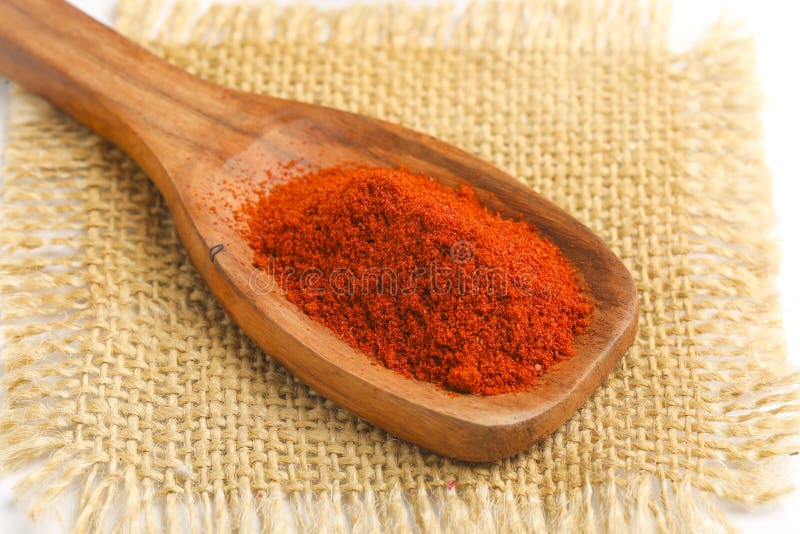 Close View of Red Chilli Powder in Wooden Spoon on White Background ...