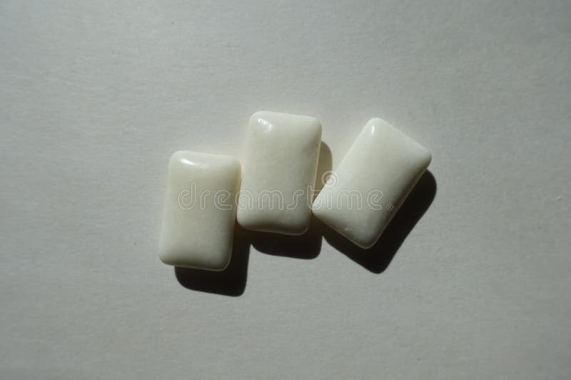 Close View of Three White Pieces of Chewing Gum Stock Photo - Image of ...