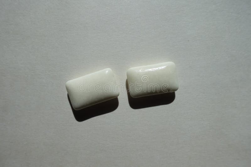 Close View of Two White Pieces of Chewing Gum Stock Image - Image of ...