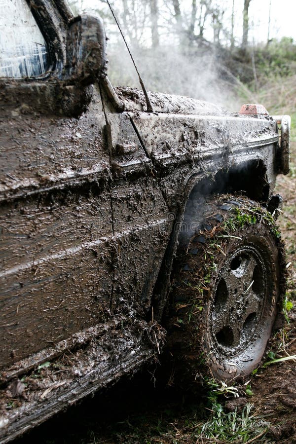 Close of View of a Very Muddy Car after Off Road Driving through the ...