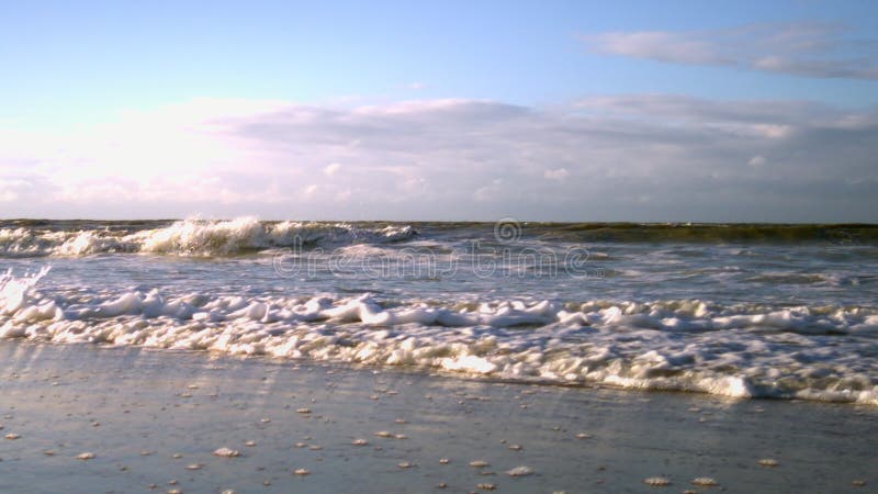 Wide-angle View of Cliff Formation in the Center with Tidal Waves of ...