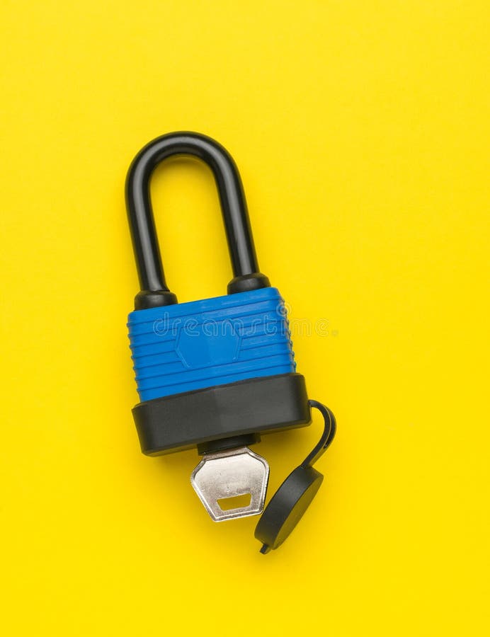 Closed All-weather Lock on a Yellow Background Stock Image - Image of ...