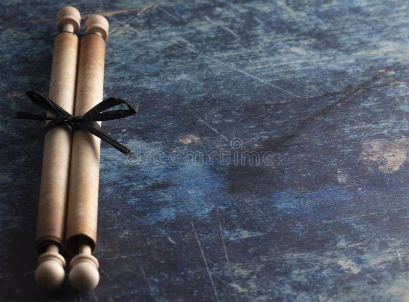 A Closed Antique Scroll on a Rustic Blue Wooden Table Stock Photo ...