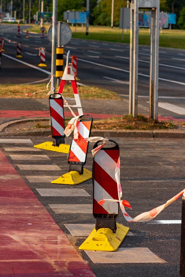 Closed of Big City Intersection, White and Red Striped Plastic Pillars ...