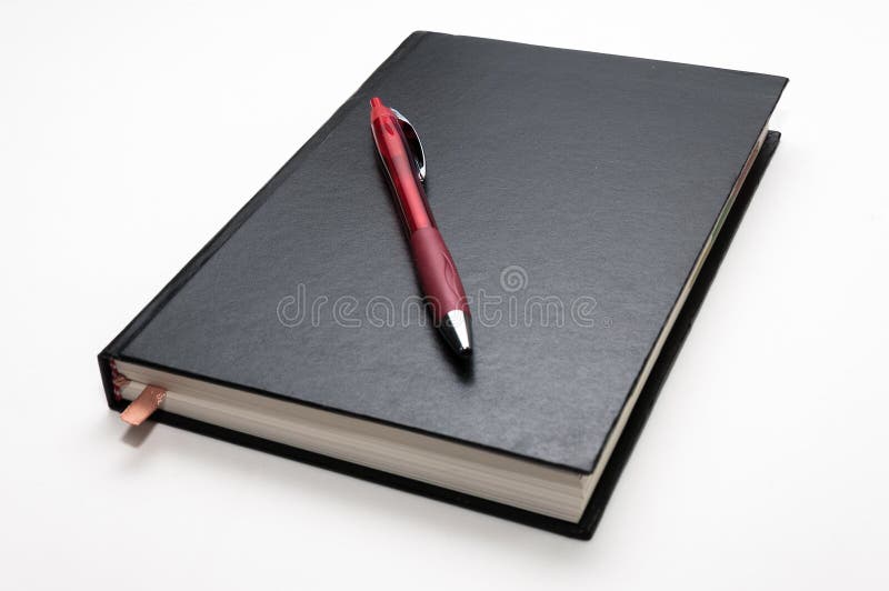 Closed book and pen stock photo. Image of detail, document - 18173846