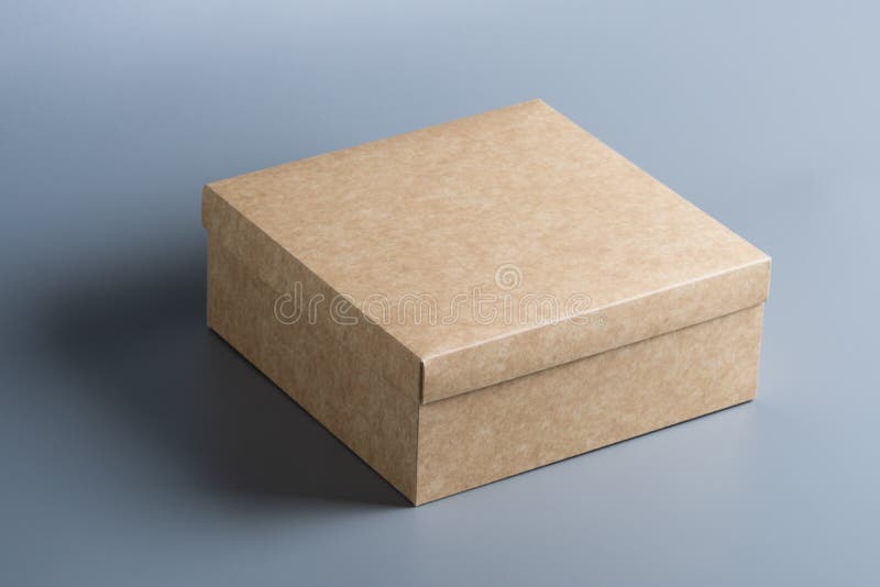 Closed Cardboard Box on Grey Background. Stock Image - Image of ...