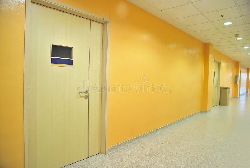 Closed Doors Along a Corridor Stock Image - Image of class, bright: 9468599