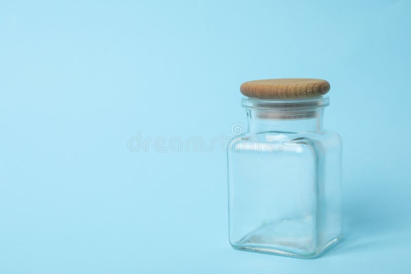 Closed Empty Glass Jar on Blue Background, Space for Text Stock Image ...