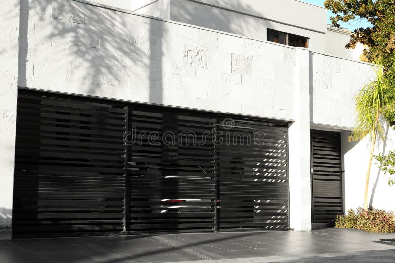 Closed Gates of Modern Garage. Exterior Design Stock Photo - Image of ...
