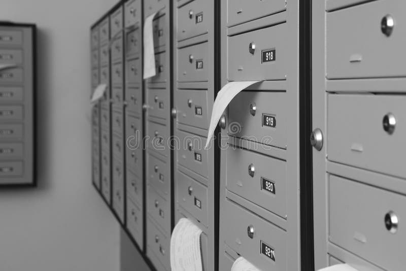 Closed Grey Metal Mailboxes with Receipts Indoors Stock Image - Image ...