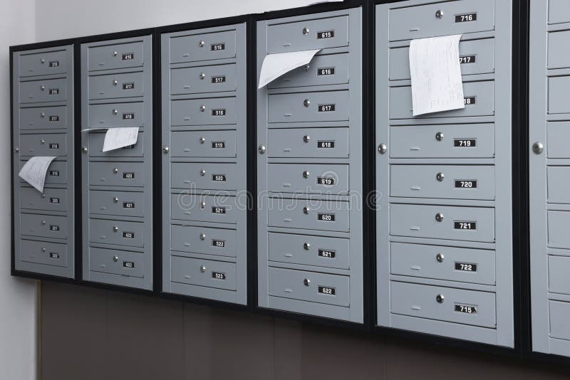 Closed Grey Metal Mailboxes with Receipts Indoors Stock Photo - Image ...