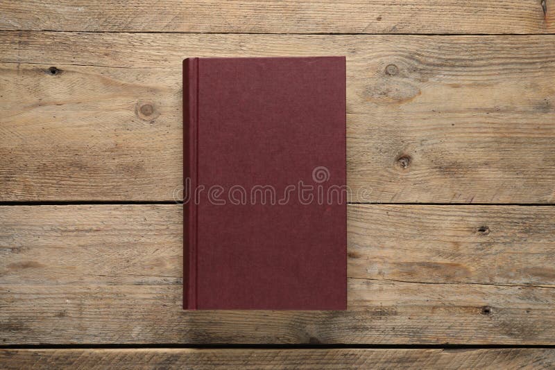 Closed Hardcover Book on Wooden Table, Top View Stock Image - Image of ...