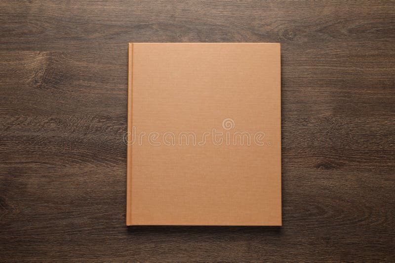 Closed Hardcover Book on Wooden Table, Top View Stock Image - Image of ...