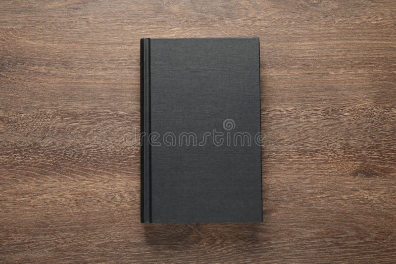 Closed Hardcover Book on Wooden Table, Top View Stock Photo - Image of ...