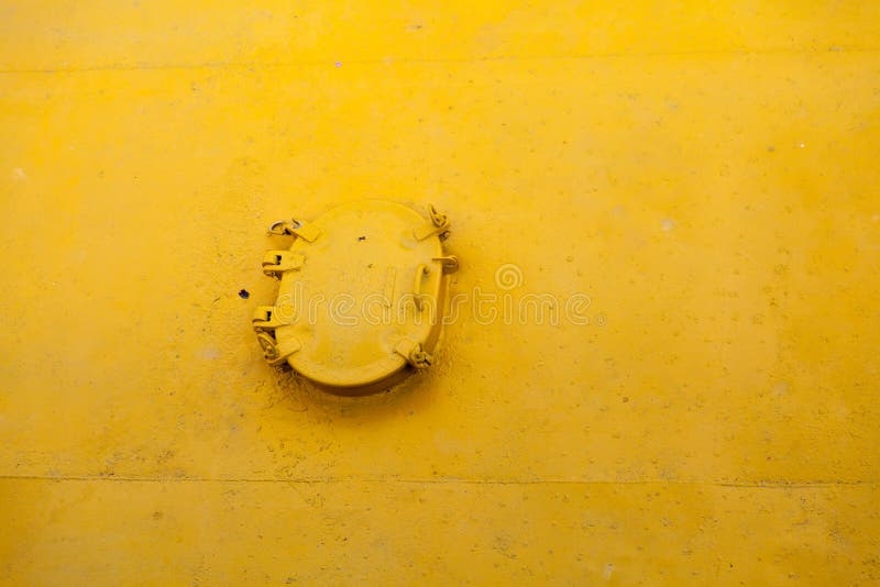 Closed Hatch on Yellow Surface Stock Photo - Image of handle, closed ...