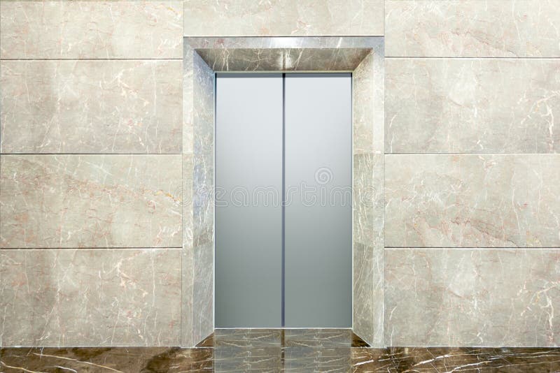 Closed Lift Door with a Pattern Design on the Door Stock Image - Image ...