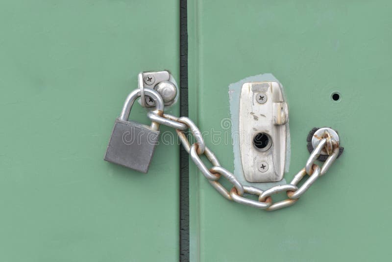 Closed Metal Green Door with Lock and Chain Stock Image - Image of ...