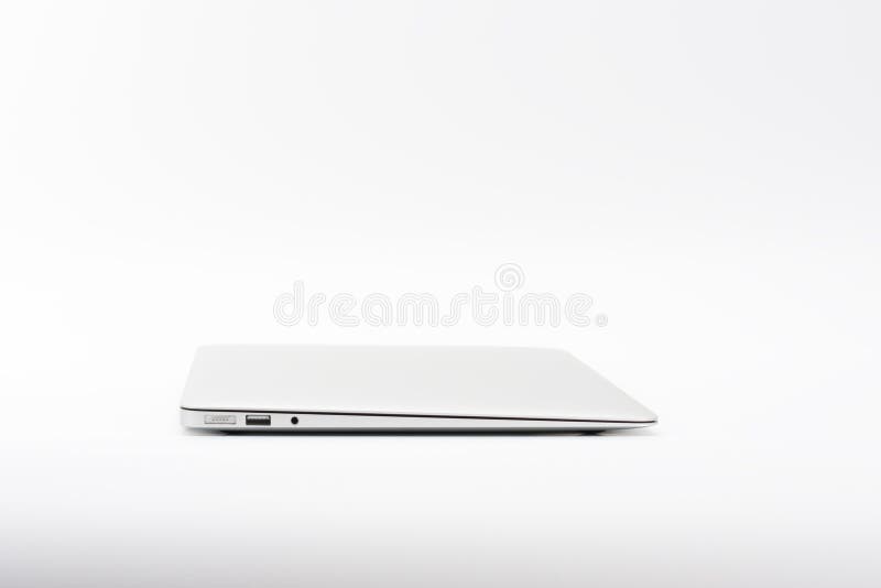 Closed Modern, New Laptop on White Background, Front View Stock Photo ...