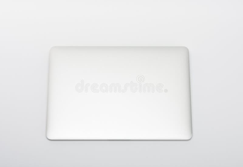 Closed Modern, New Laptop on White Background, Front View Stock Photo ...