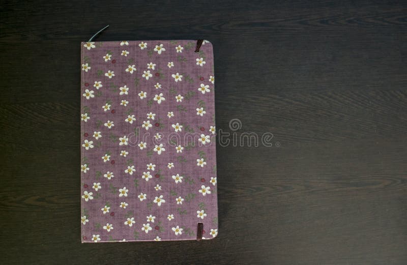 A Closed Notebook on a Table Stock Photo - Image of study, notebook ...