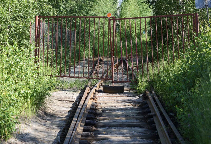 Closed Old Rusty Gates on an Abandoned Railway Stock Photo - Image of ...