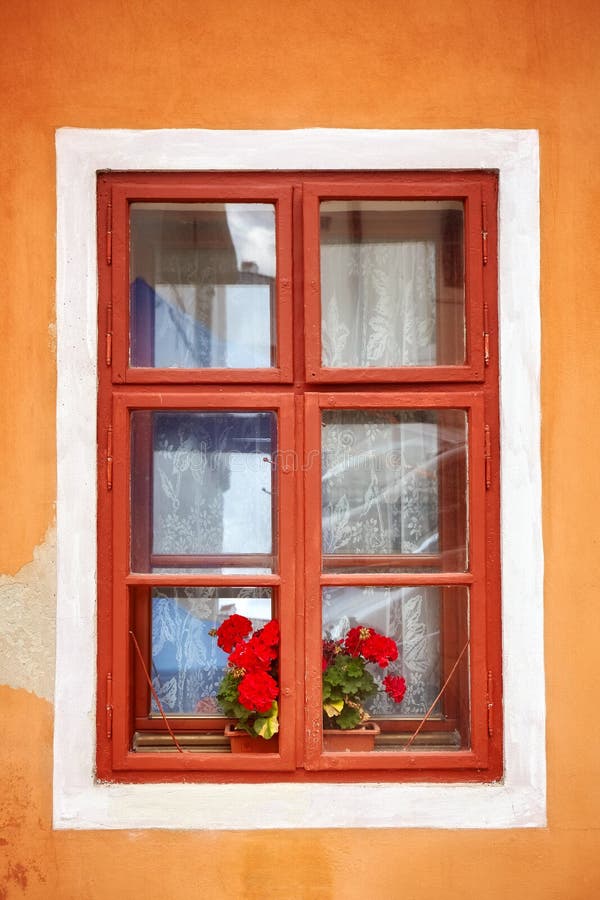 Closed Old Window with Red Flowers in Orange Wall Stock Image - Image ...