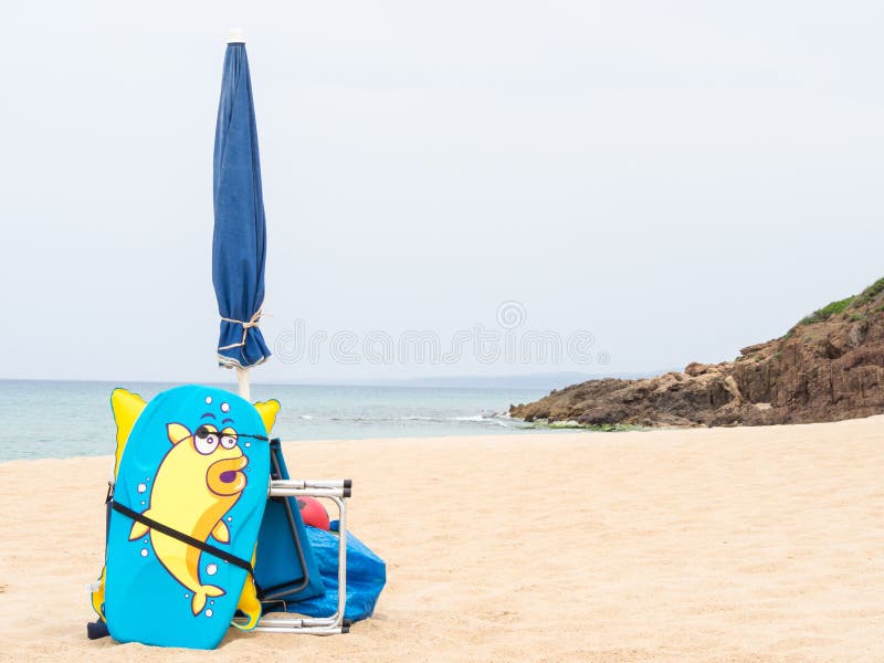 Closed Parasols on the Beach Stock Image - Image of parasol, umbrella ...