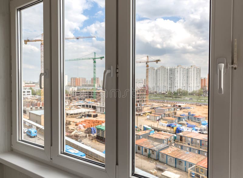 Closed Plastic Windows. Blurred View of Construction Site and Cl Stock ...