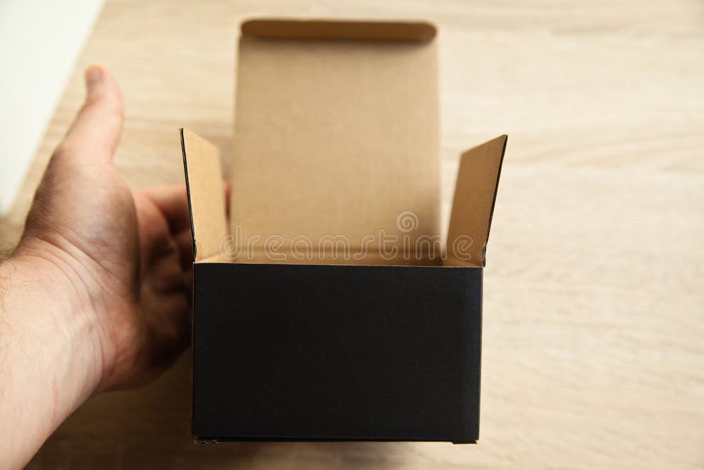 Closed Rectangular Cardboard Box with Corrugated Cardboard Lid and Hand ...