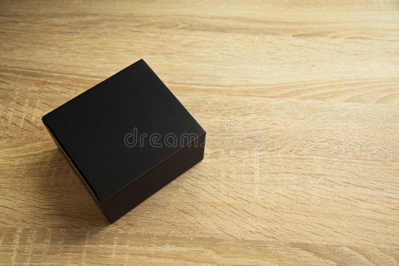 Closed Rectangular Cardboard Box with Corrugated Cardboard Lid, on Oak ...