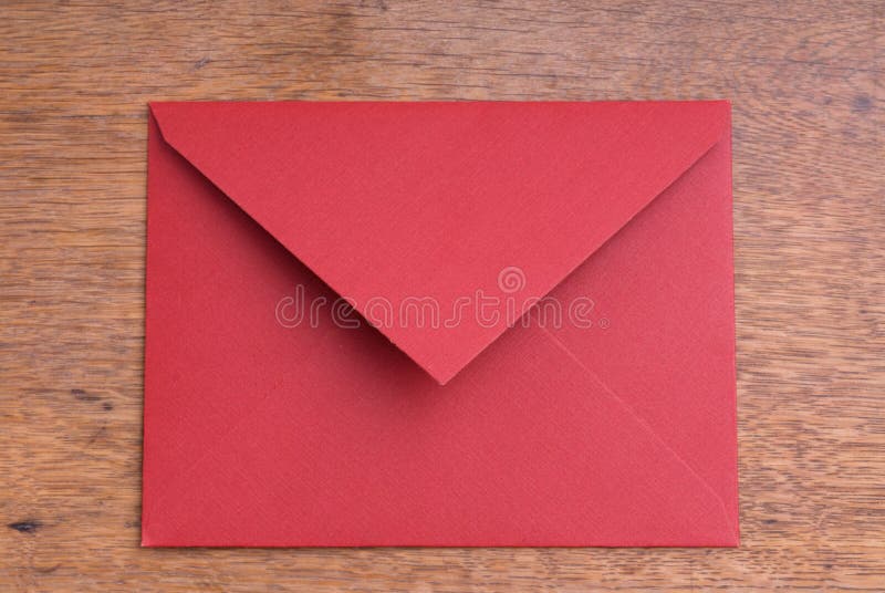 Closed Red Envelope on a Wooden Table Stock Image - Image of ...