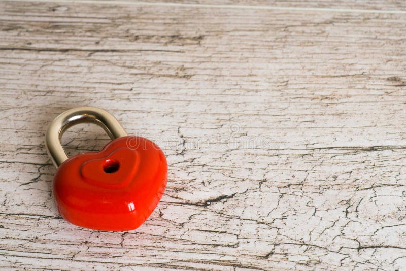 Closed Red Heart Shaped Lock on Table Stock Image - Image of freedom ...