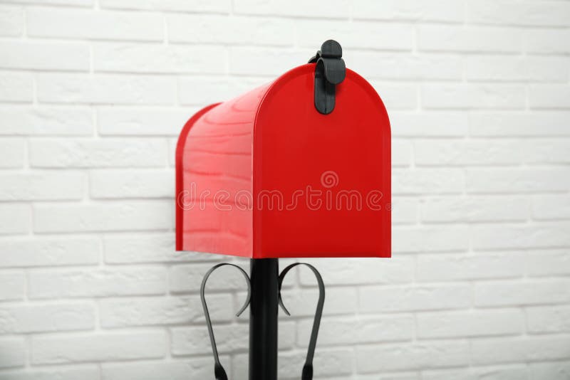 Closed Red Letter Box Near White Brick Wall Stock Photo - Image of ...