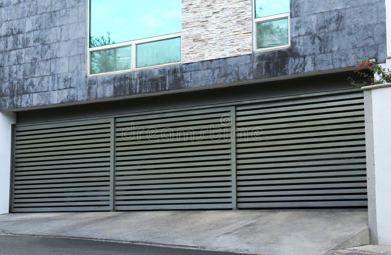 Closed Roller Shutter Gates of Modern Garage Stock Photo - Image of ...