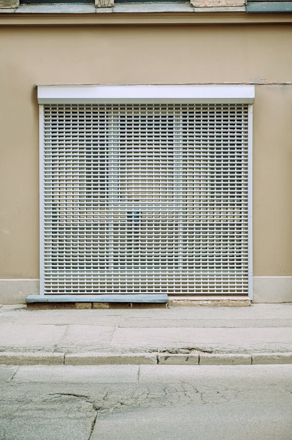 Closed Roller Shutter on the Store, Stores are Closed Due To the Crisis ...